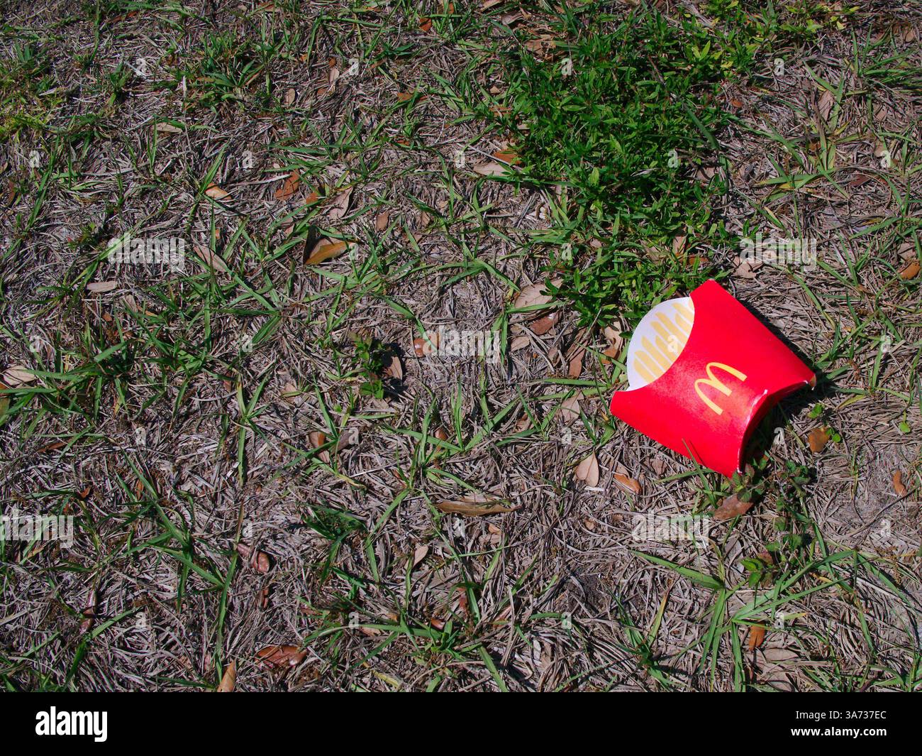 Editorial Use Only March 20, 2025. St. Petersburg, FL, USA, Discarded McDonald's red french fry ...