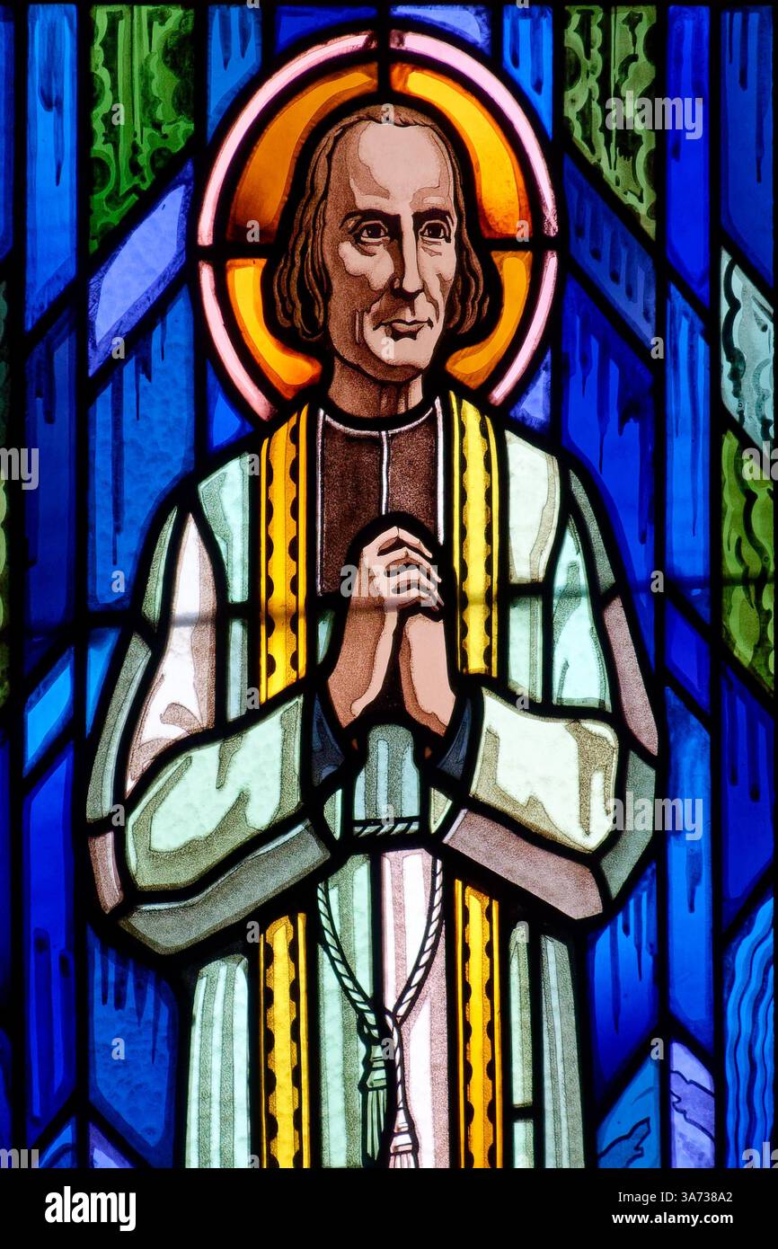 Paris, FRANCE - 09–11-2024: Stained glass of St. John Mary Vianney or Saint Jean-Marie Vianney ...