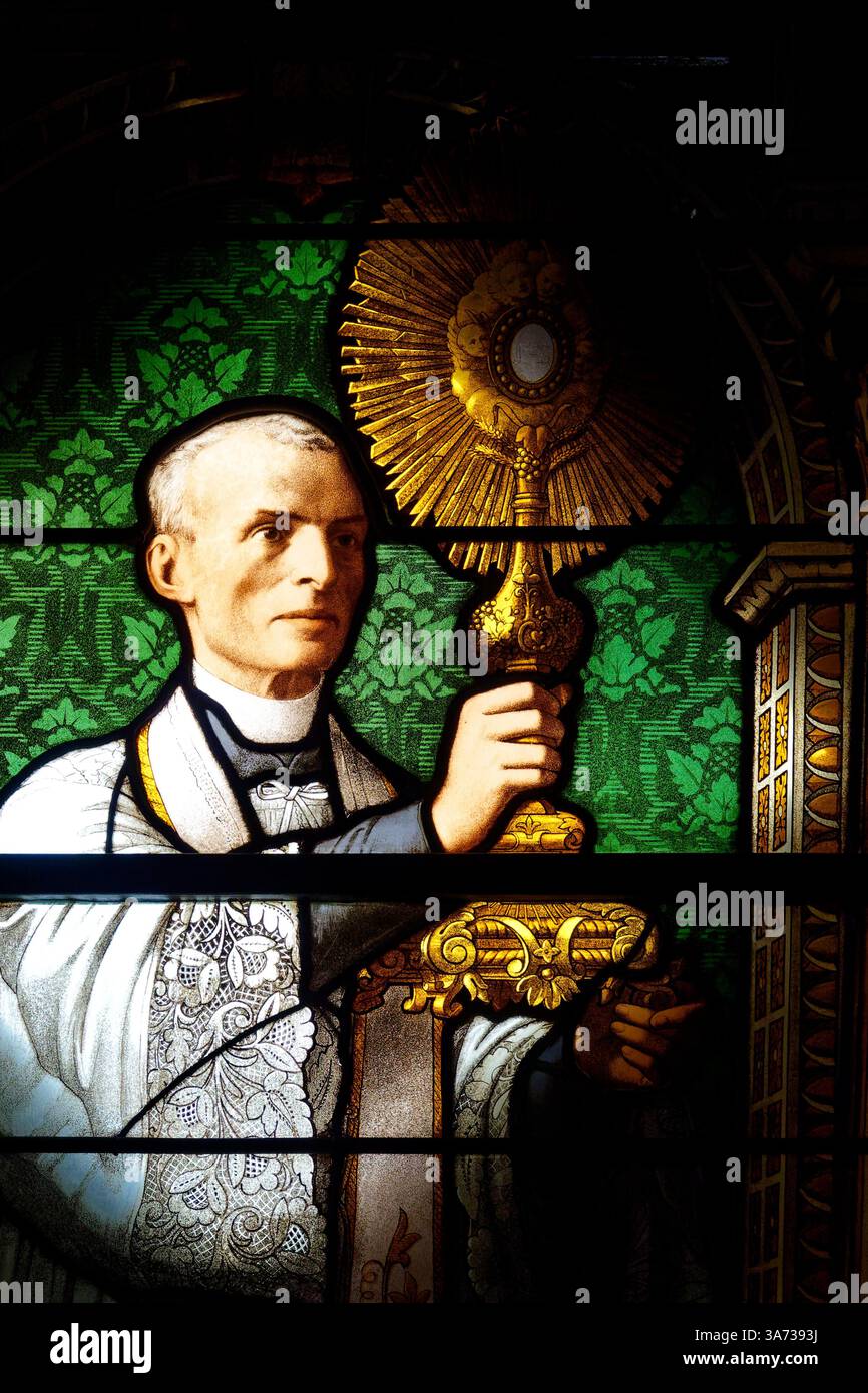 Paris, FRANCE - 09–13-2024: Stained glass of Saint Pierre Julien Eymard ...