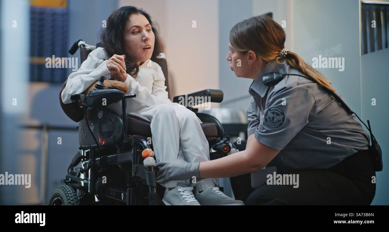 Security Checkpoint: Female TSA Officer Checking Woman with Physical Disability in Airport ...