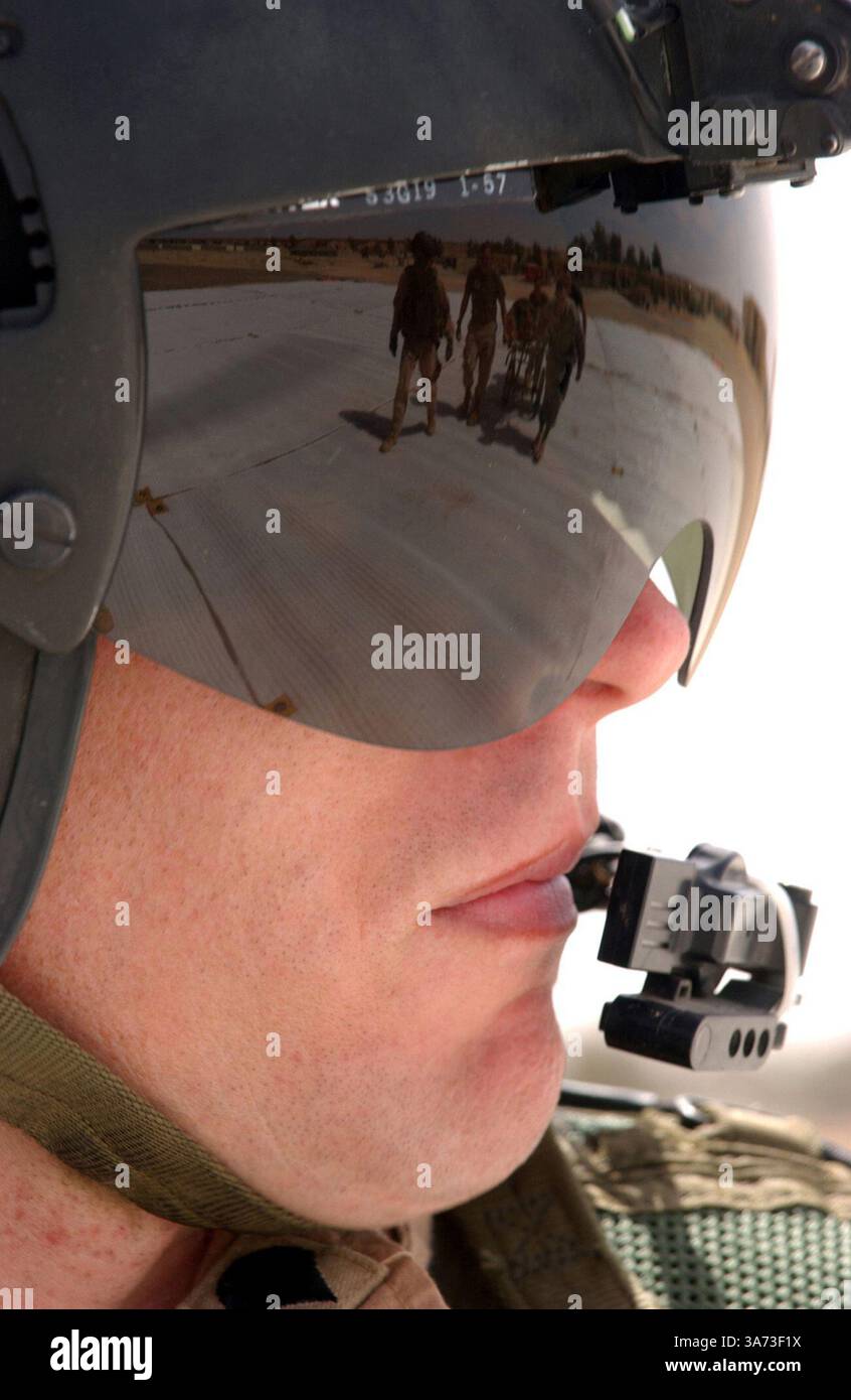 Apr 26, 2004; Al Asad, Iraq; Spc. WESLEY K. HILL, UH-60 Blackhawk crew ...