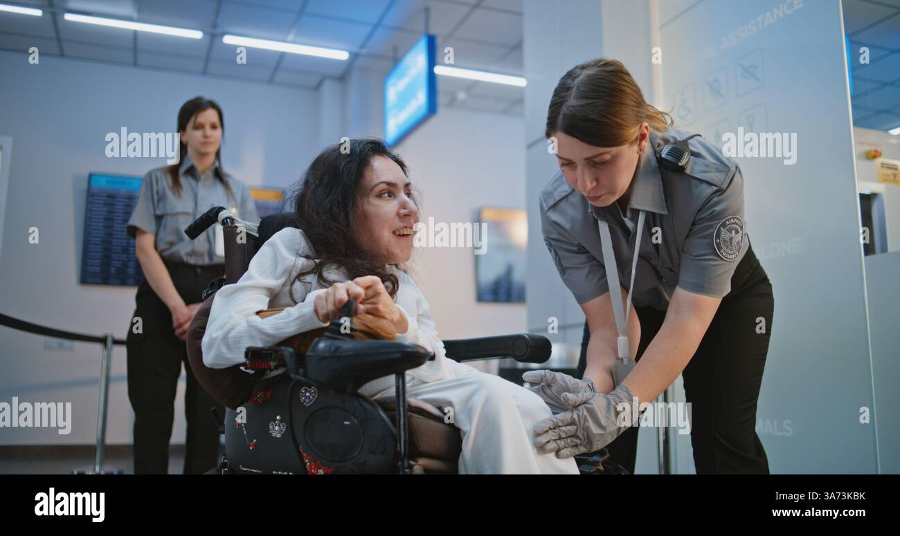 Screening Procedures at Security Checkpoint: Female TSA Officer ...