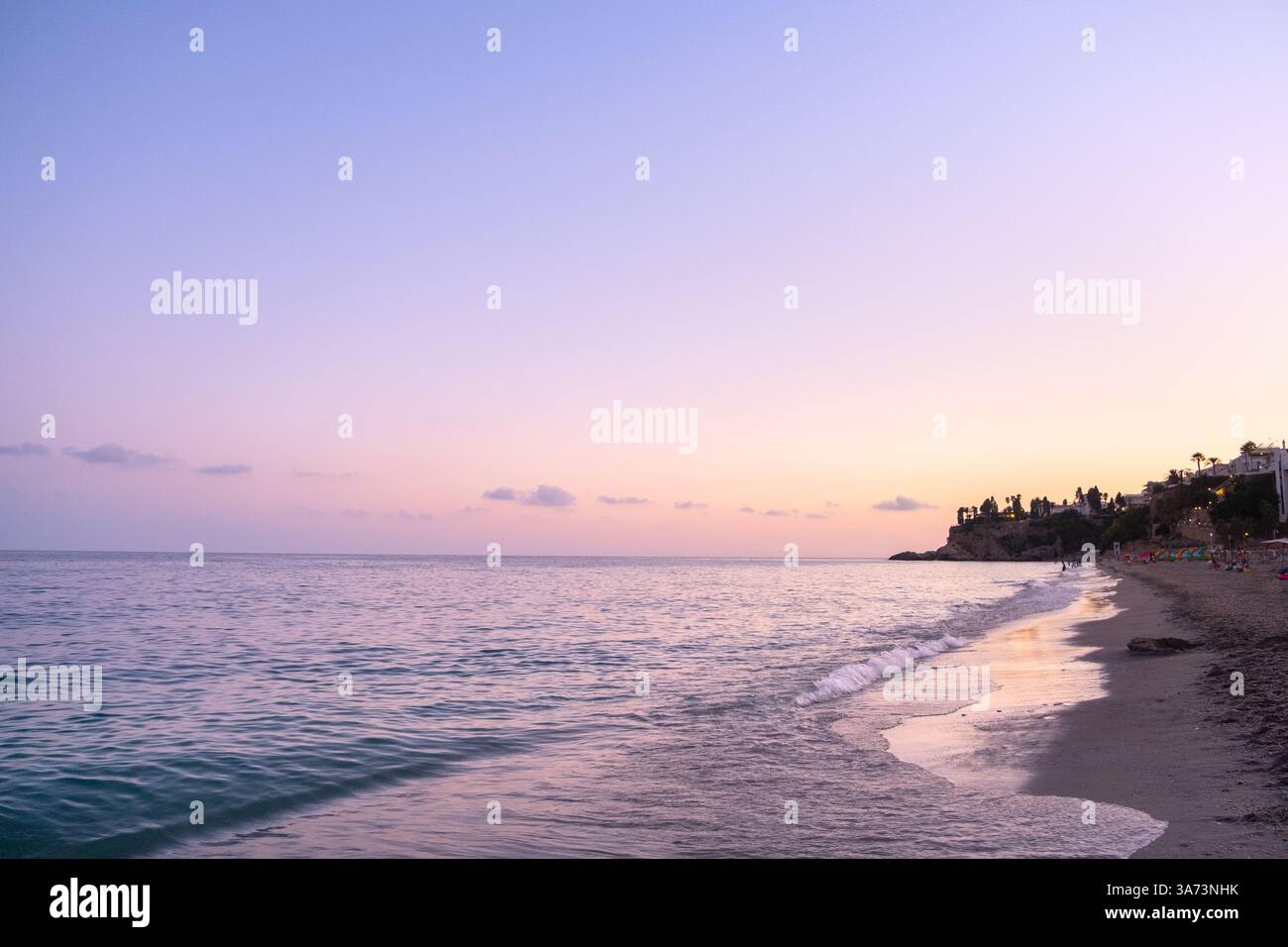 Landscape at sunset of a town in southern Spain. The beach empty and ...