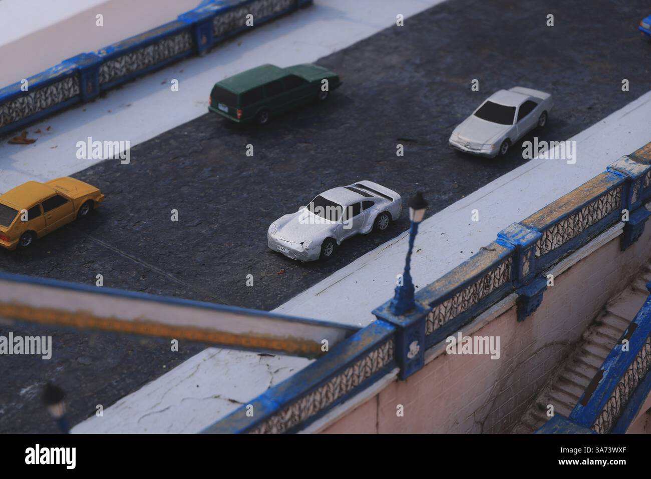 Miniature Cars Arranged on a Detailed Model Street Scene for Display ...