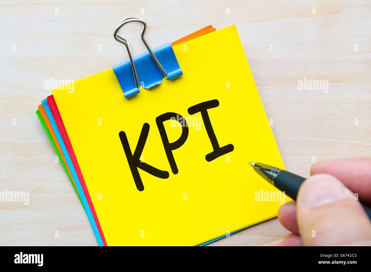 Key Performance Indicator text on yellow notepad. KPI concept Stock ...