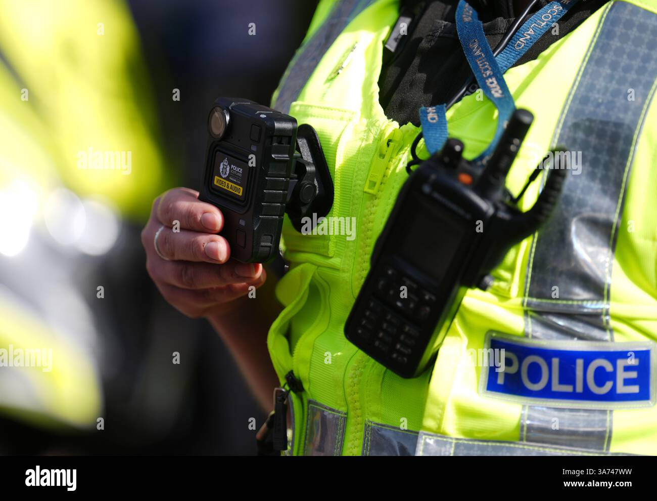 A body-worn video camera is held during the Police Scotland national ...