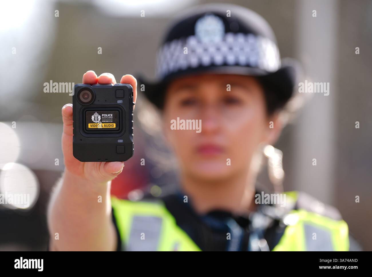 PC Anna Bannerman holds a body-worn video camera during the Police ...