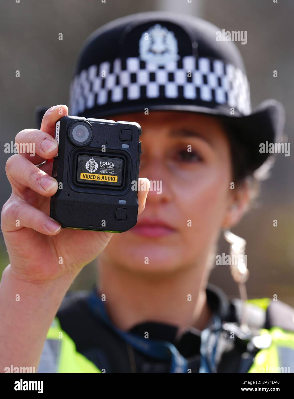 PC Anna Bannerman holds a body-worn video camera during the Police ...