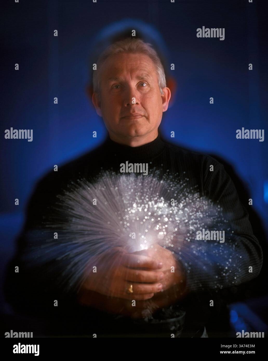 Jul 07, 1993; Chicago, IL, USA; (File Photo) Man holds fiber optic ...