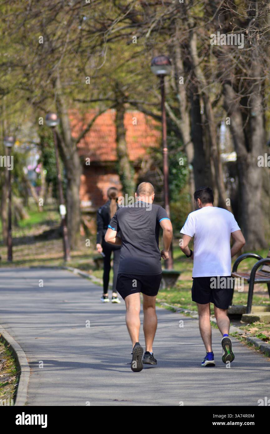 Two men running around the lake hi-res stock photography and images - Alamy