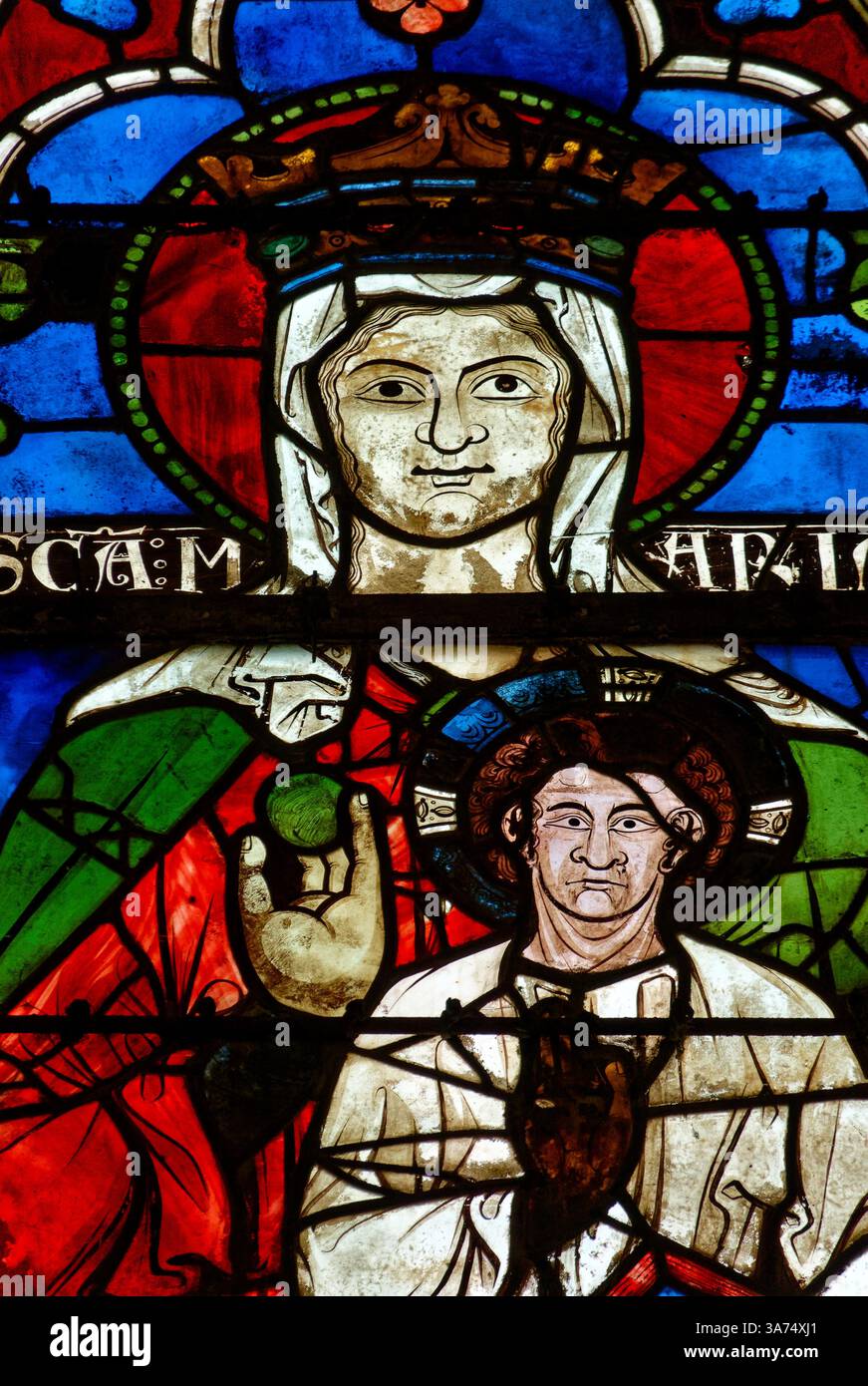 Auxerre, FRANCE - 10-16-2024: Stained glass (17th century) of Blessed Virgin Mary holding baby ...