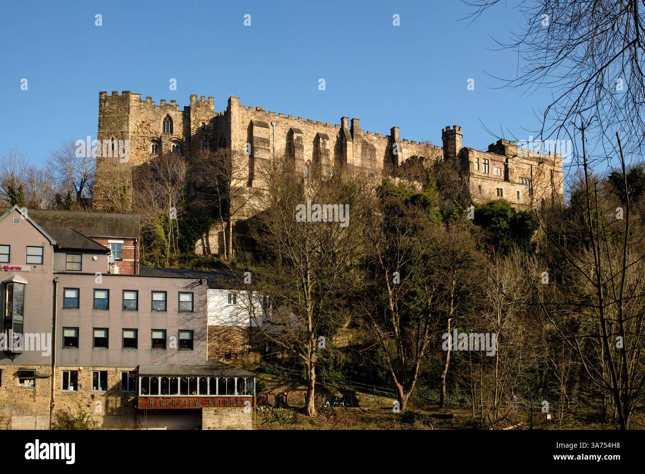 Durham Castle from the River Weir with a deep blue sky Stock Photo - Alamy