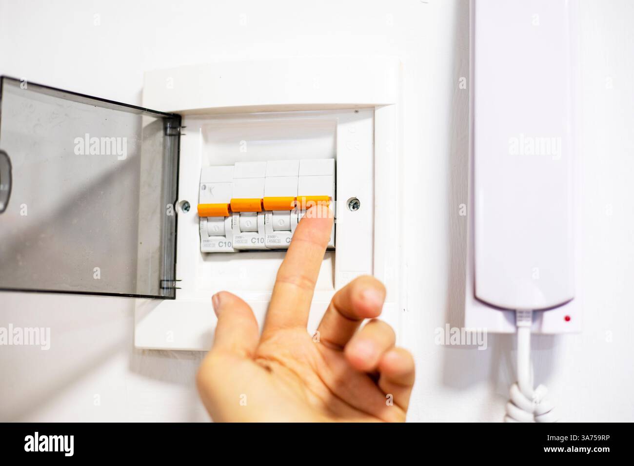 switching the panels in the network voltage in the house Stock Photo ...