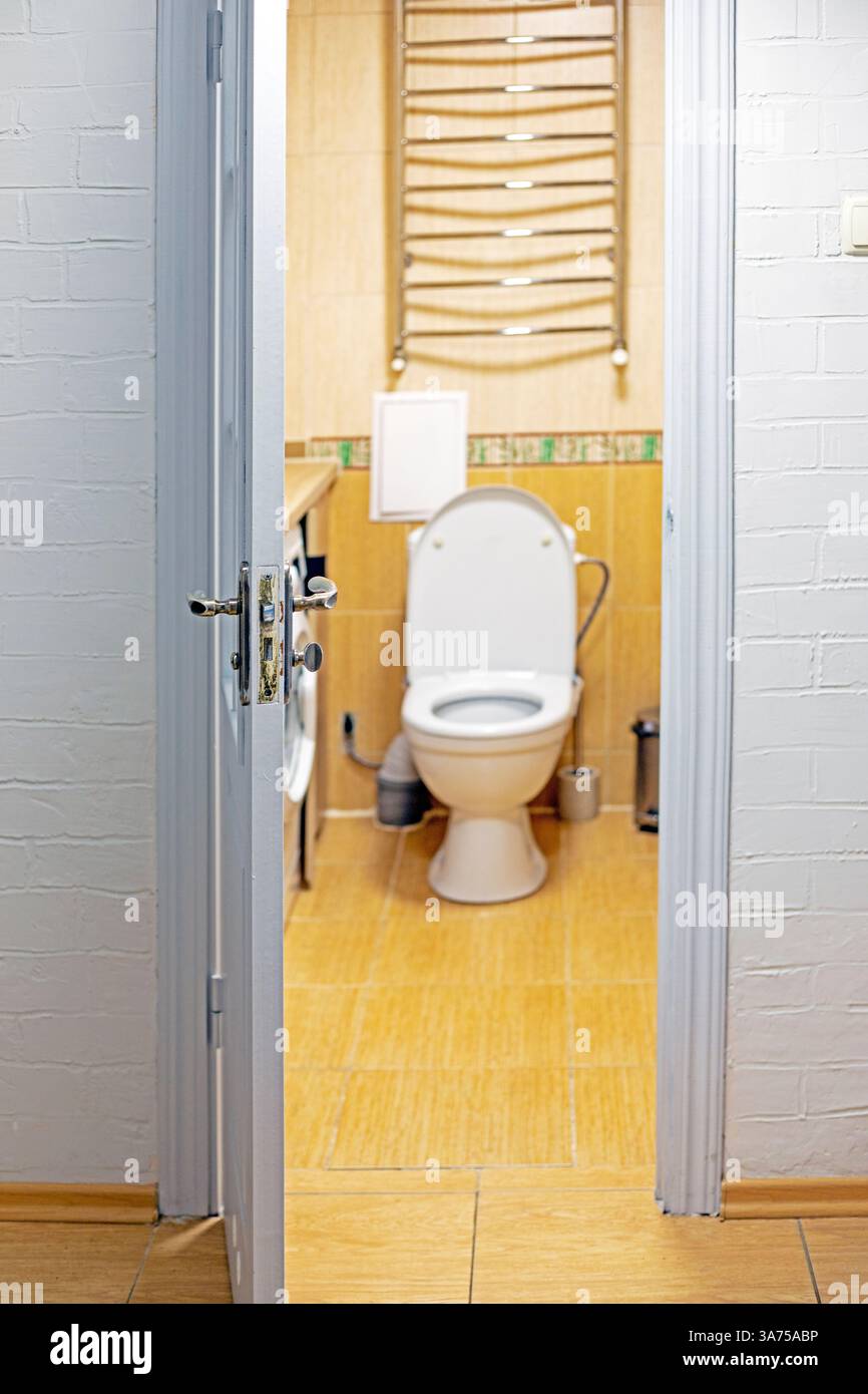 open door to the toilet room in a glass interior Stock Photo - Alamy