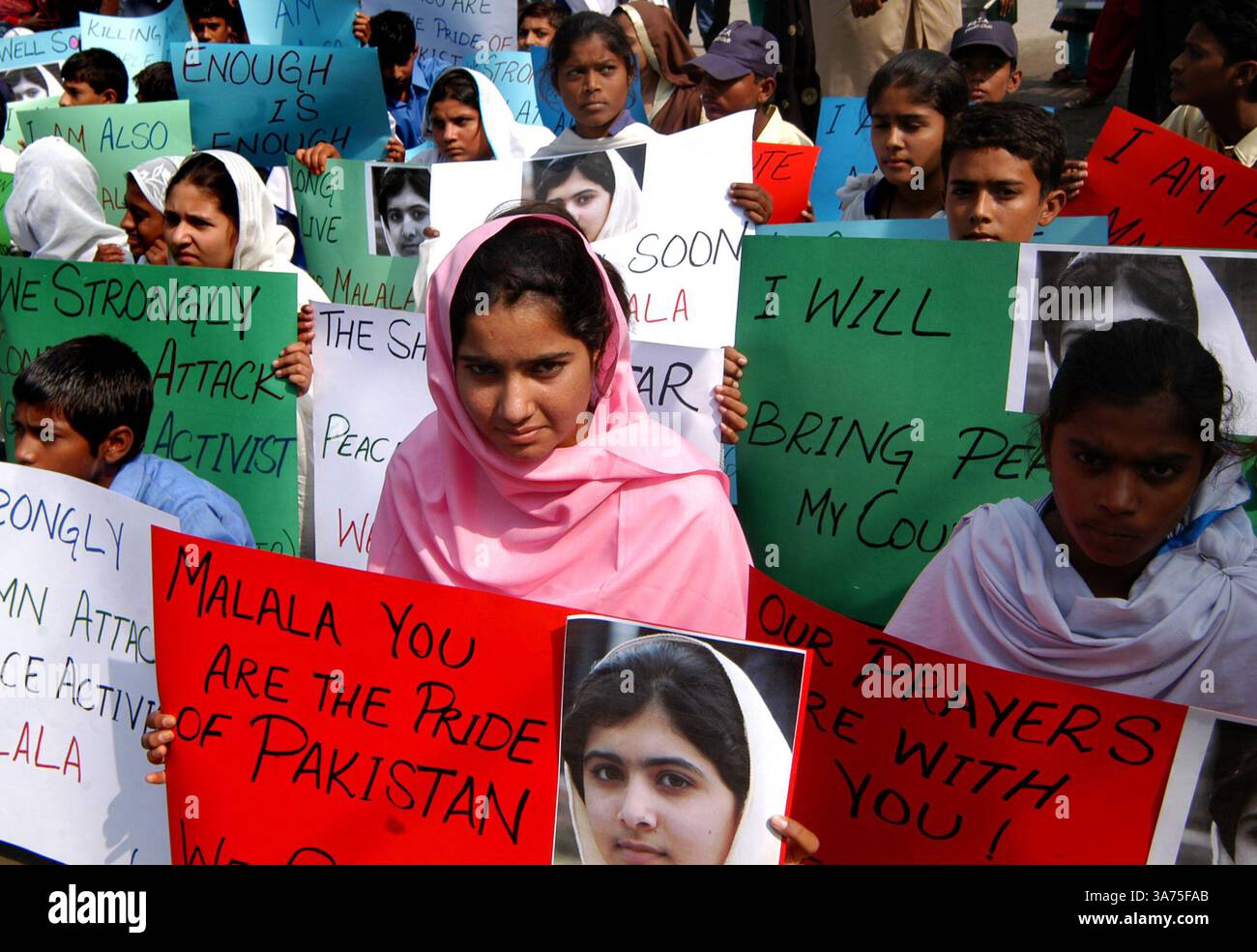 Oct. 16, 2012 - Lahore, Pakistan - Pakistani students carry placards ...