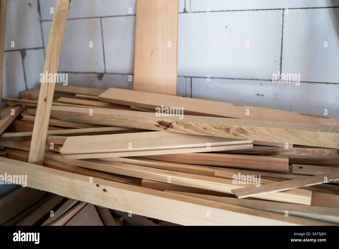 Warehouse in a carpenter's workshop with various boards and wooden ...