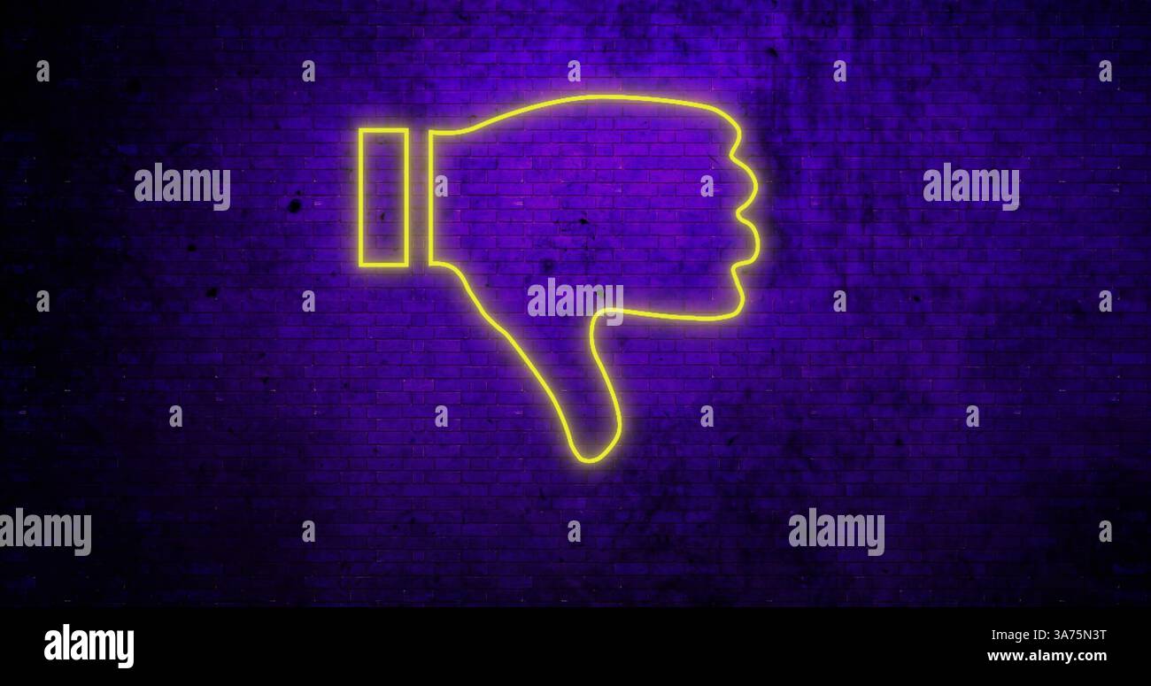 Neon yellow thumbs down sign glowing against dark purple brick wall ...
