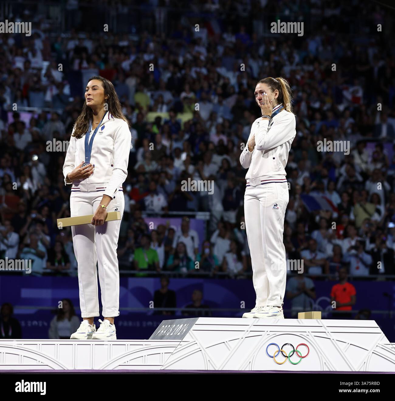 July 29th, 2024 - Paris, France: Sara Balzer and Manon Apithy-Brunet of France win the silver ...