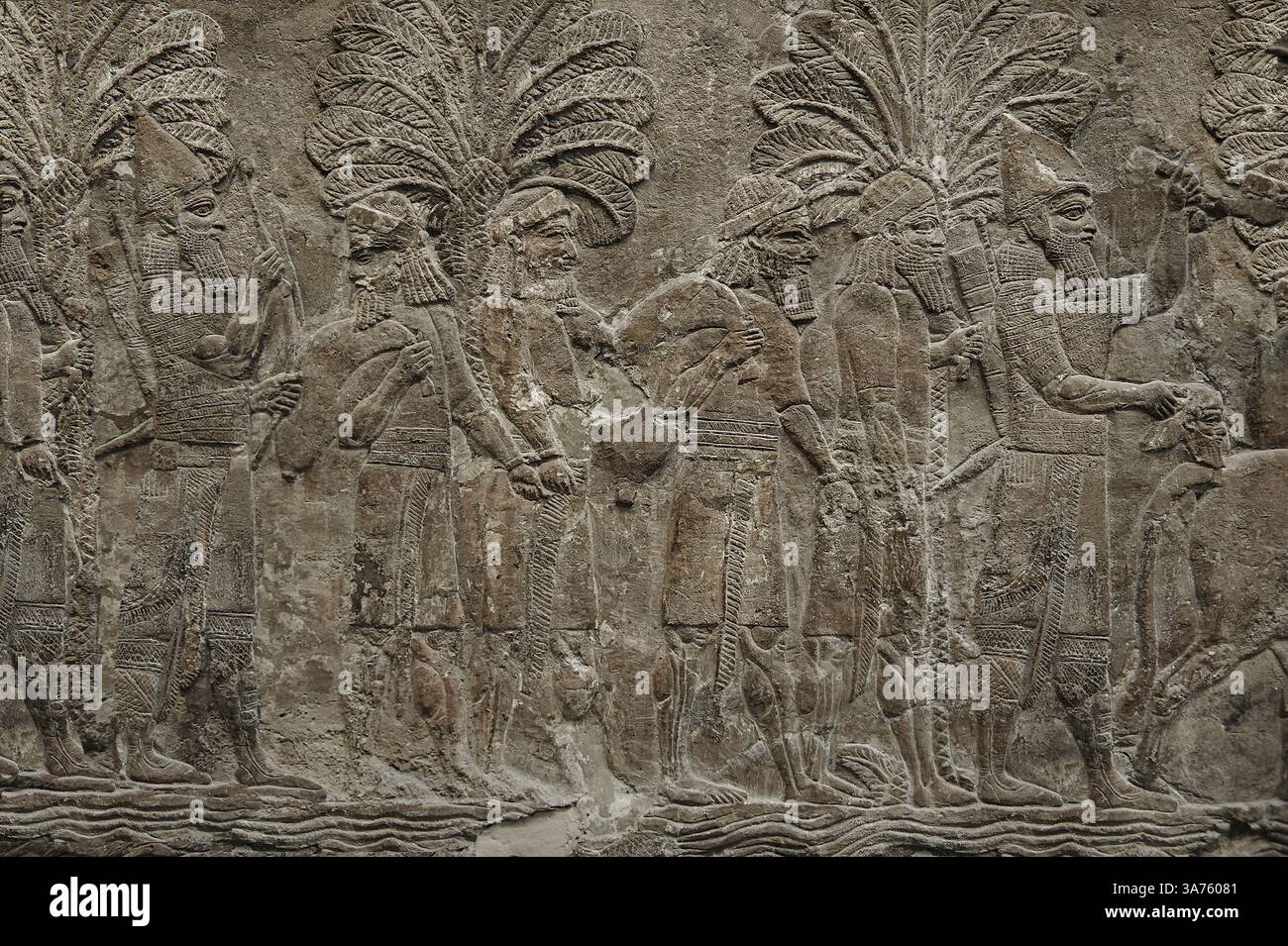 Assyrian bas relief sculpture panel showing Assyrian solders with ...