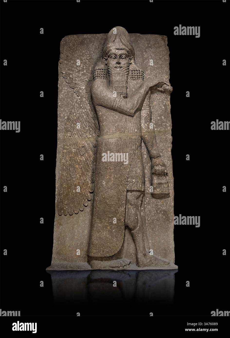 Assyrian sculpture of a human-headed winged protective gene spirit. 710-705 BC Sargon II reign ...