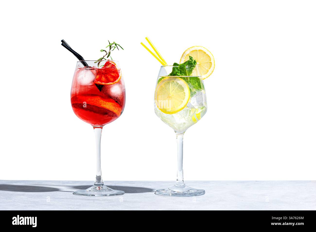 Summer Spritzer Cocktails on gray concrete table isolated on white ...