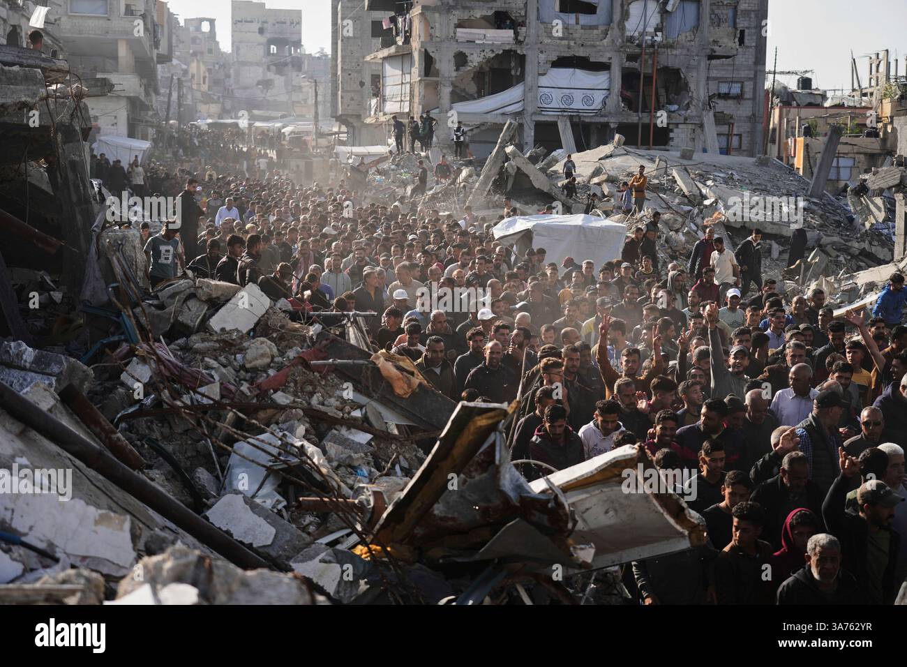 Palestinians attend an anti-war protest and against Hamas in a rare ...