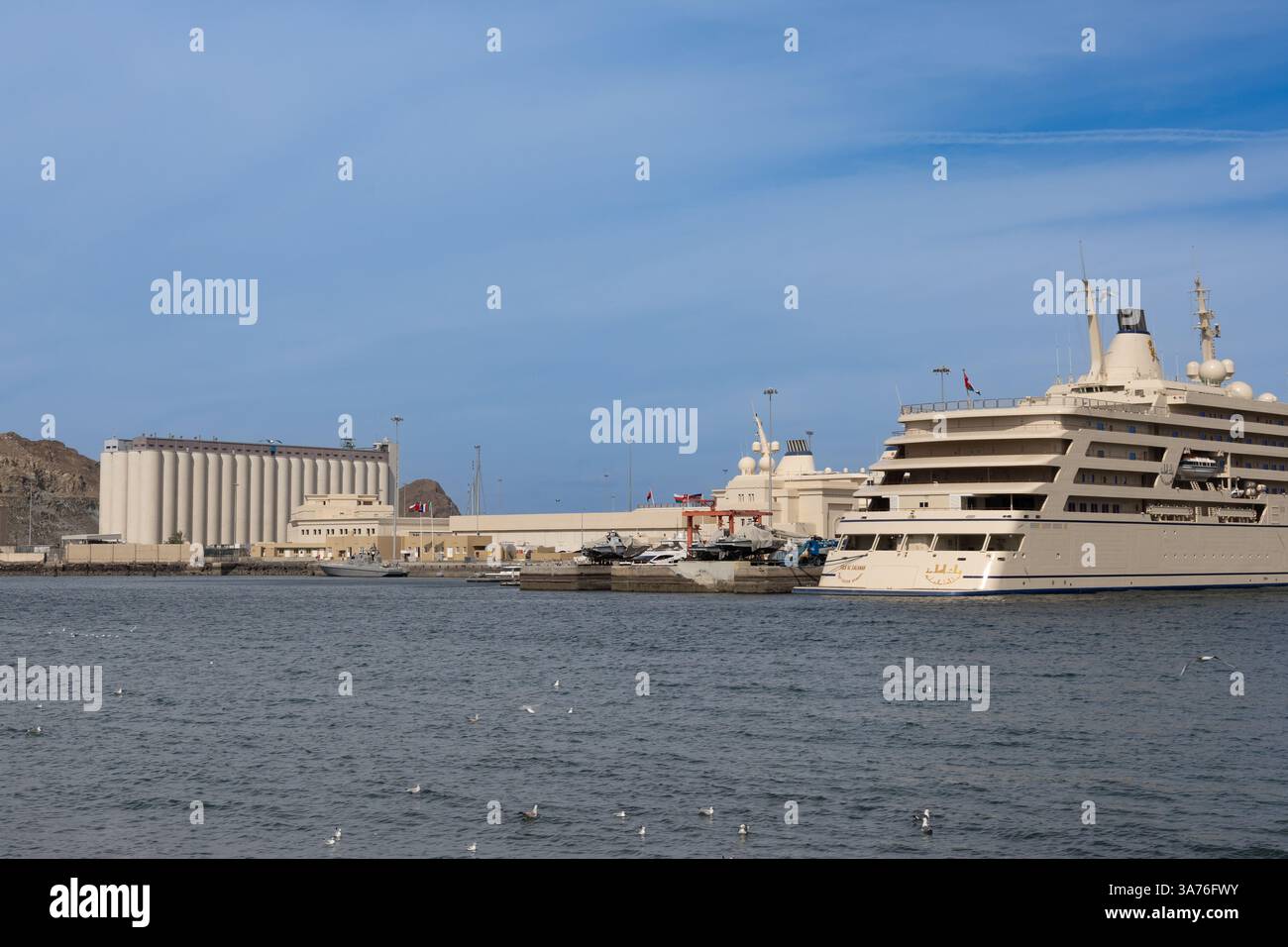 Muscat, Oman. February 07, 2025. Silos and Al Sultan Kaboos Port Ship ...