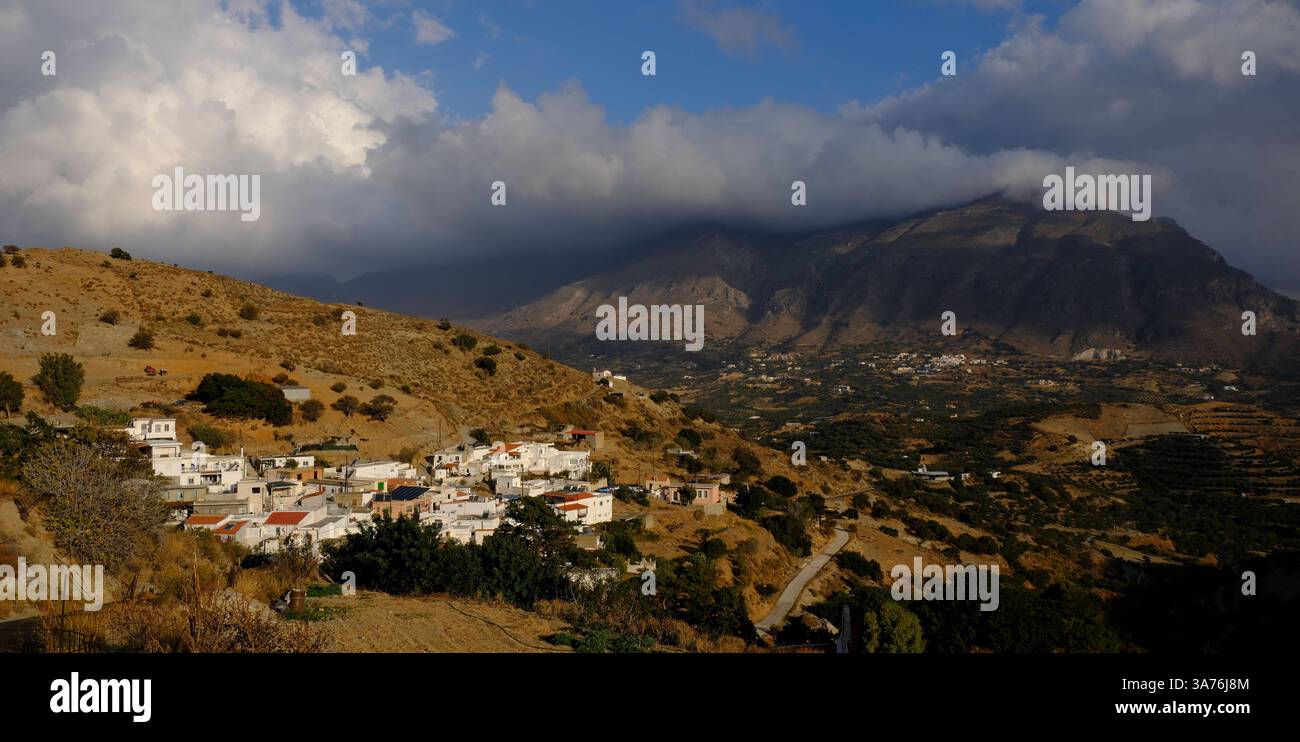 Here's a caption for the image: A scenic view captures a small village ...