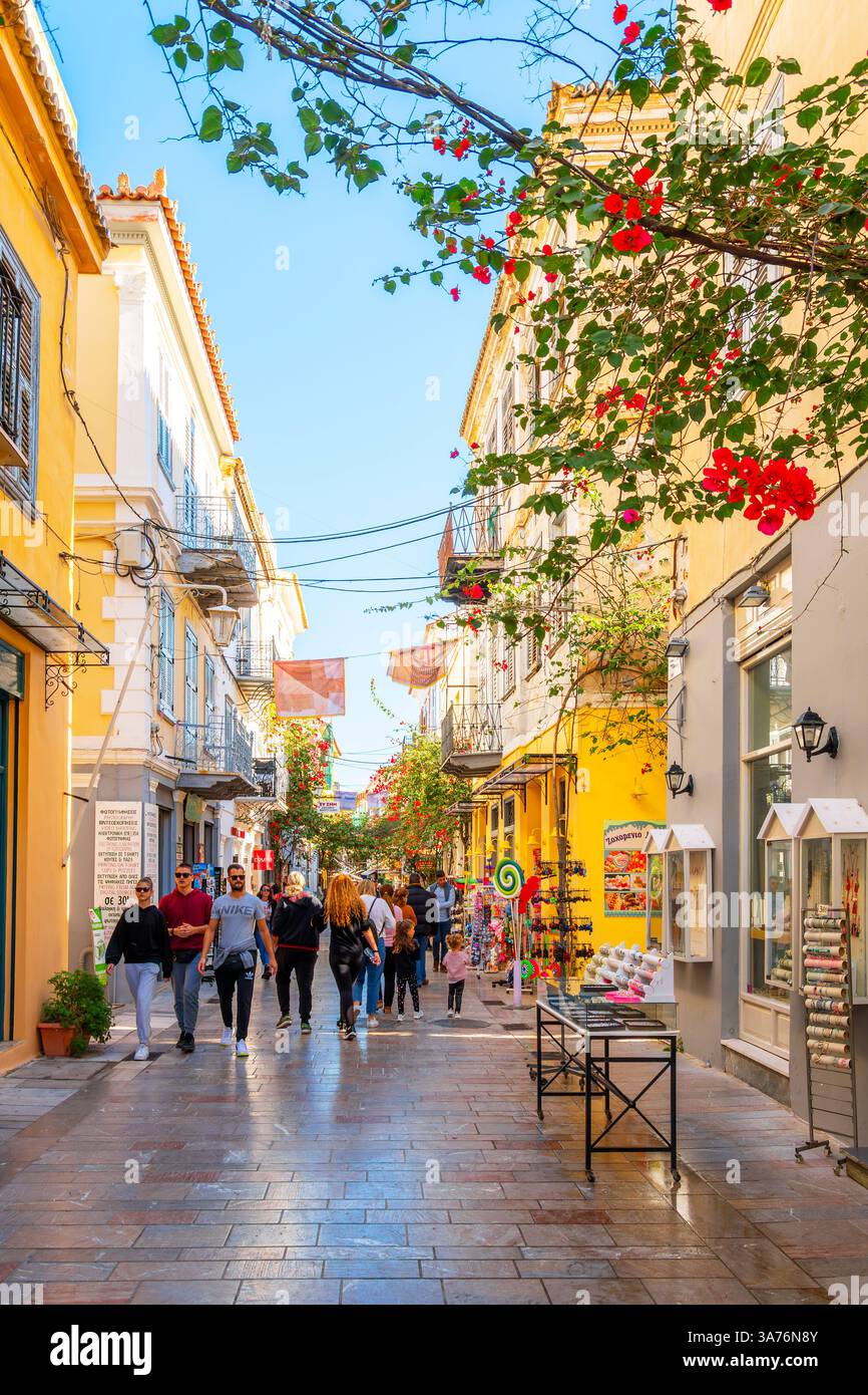 A colorful and narrow alley of shops and cafes in the historic old town ...