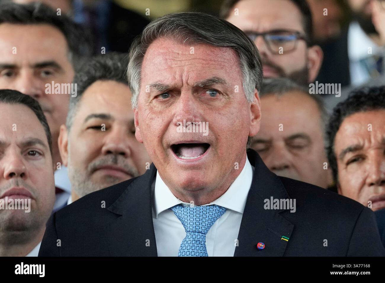 Brazil's former President Jair Bolsonaro speaks to the press at ...