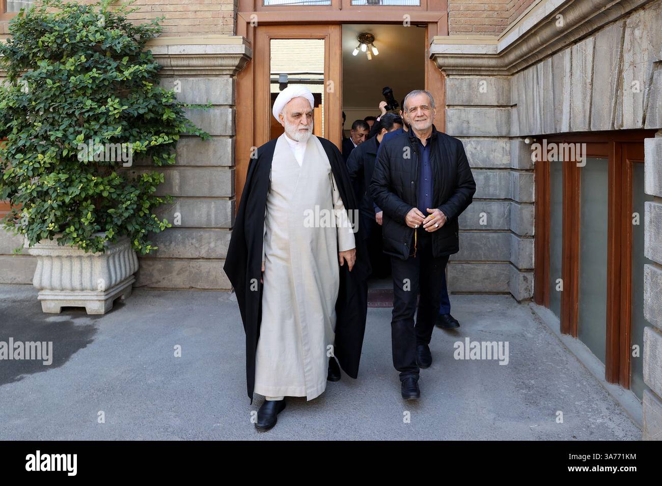 Tehran, Iran. 26th Mar, 2025. Iran's President MASOUD PEZESHKIAN )R ...