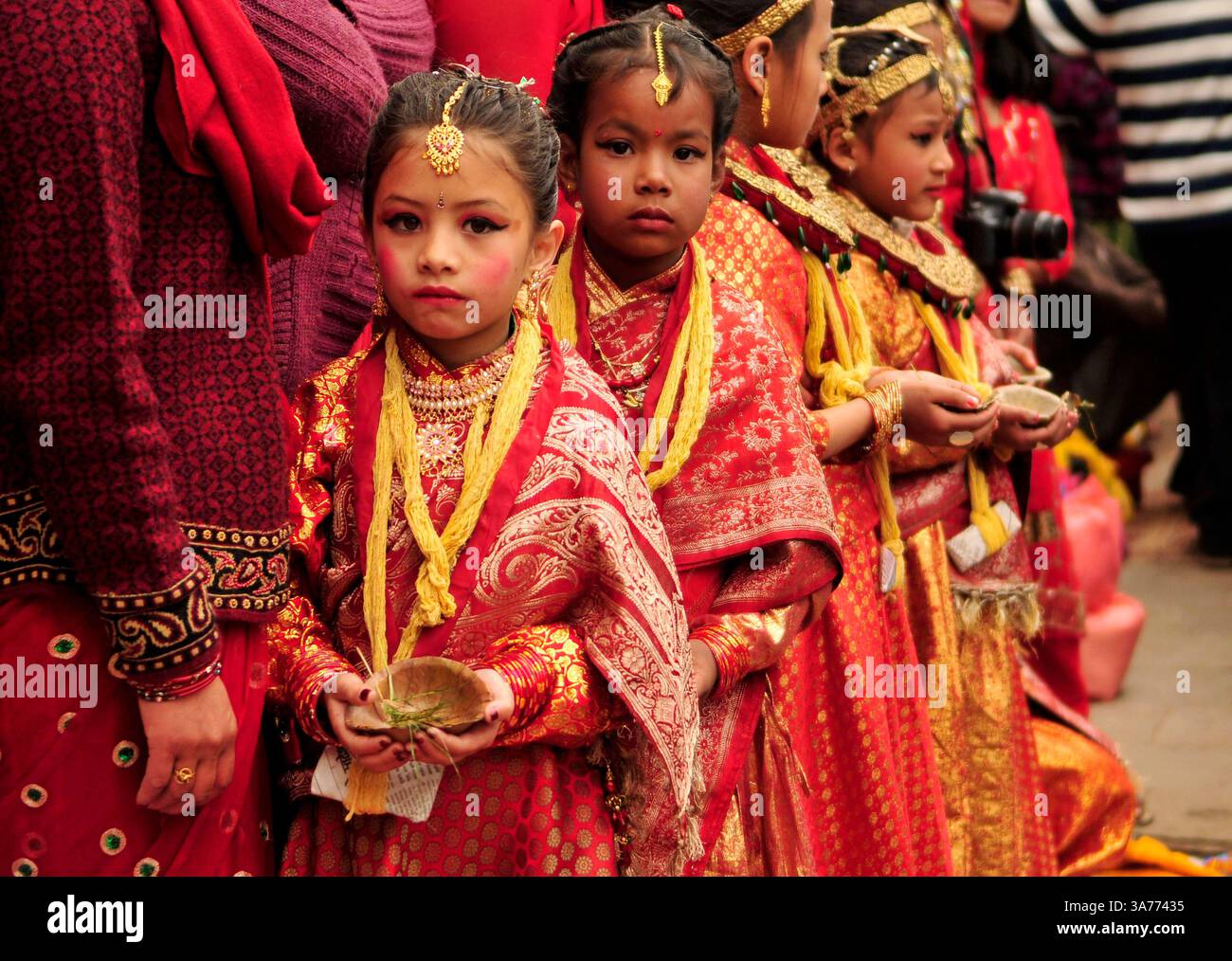 Feb. 2, 2013 - Kathmandu, Nepal - Newar girls waits in line to ...