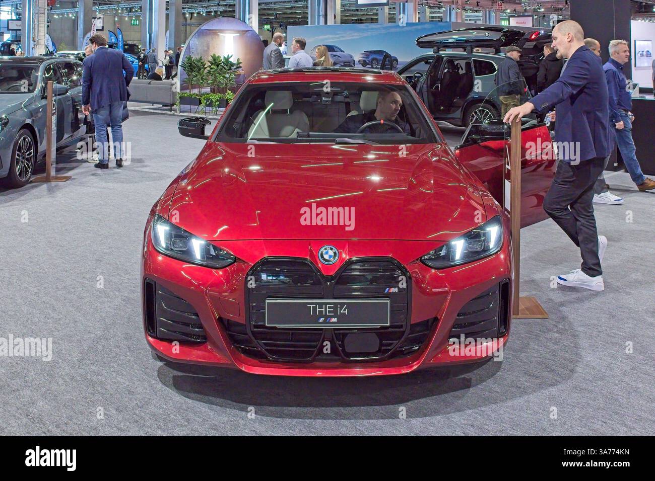 Pasila, Helsinki, Finland – March 14. 2025: BMW i4 car at AUTO 25 and ...