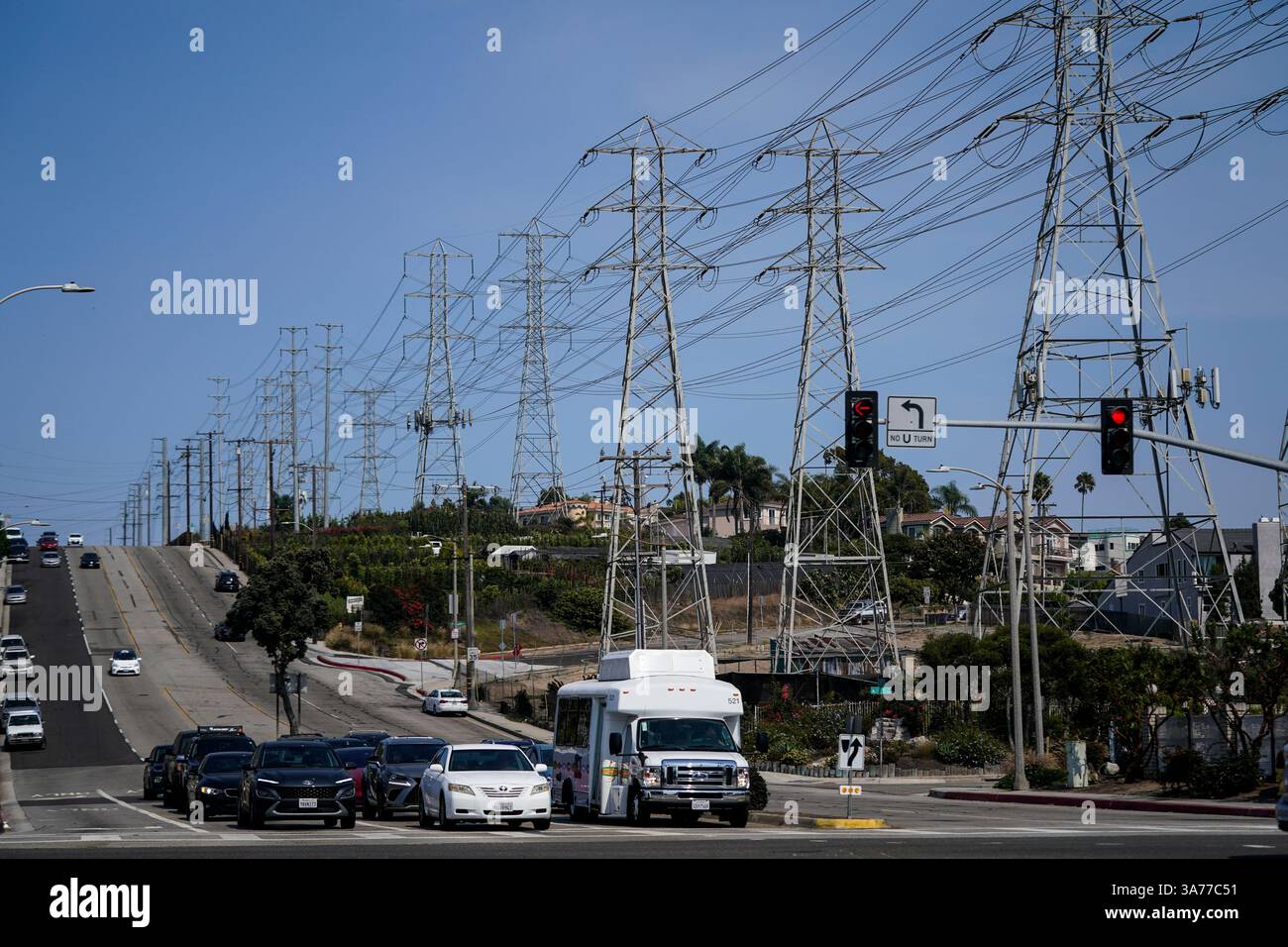 FILE - Power transmission towers line a street in Redondo Beach, Calif ...