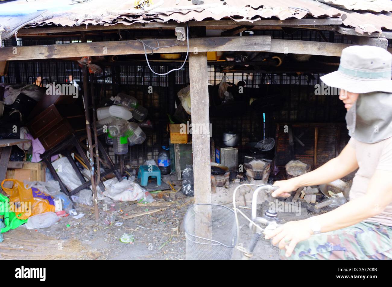 June 09, 2012 - Klong Toei, Bangkok, Thailand - A mad man circling ...
