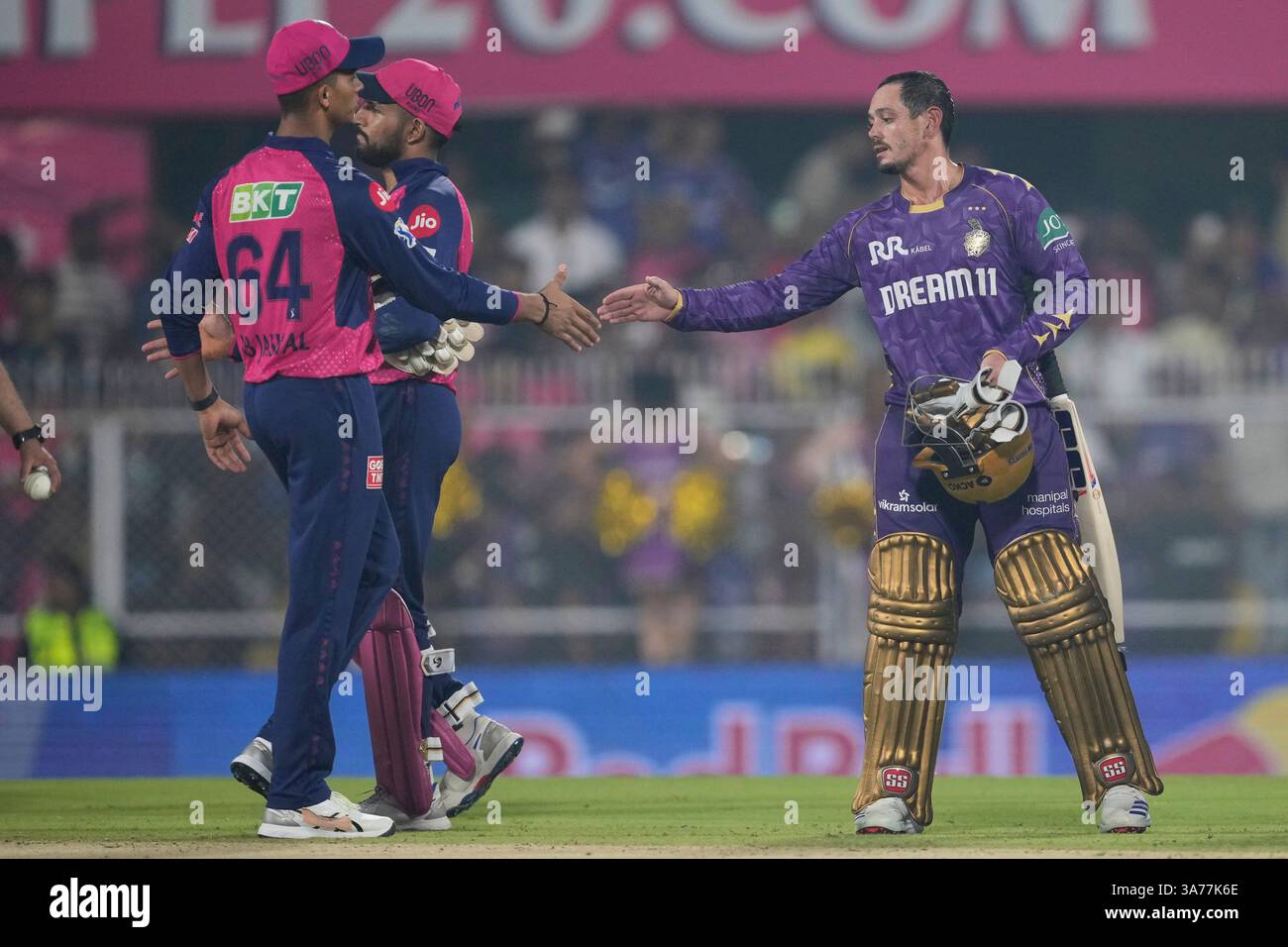 Kolkata Knight Riders' Quinton de Kock, right, greeted by Rajasthan ...