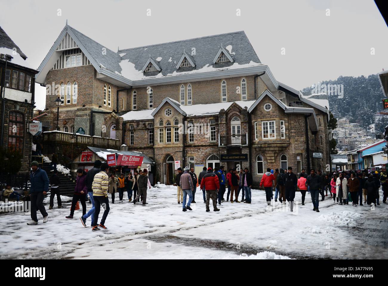 Tourists on the street of Shimla after snowfall Stock Photo - Alamy