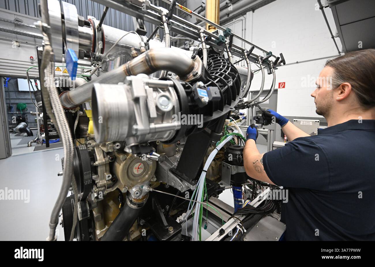 Stuttgart, Germany. 21st Mar, 2025. An employee of the automotive ...