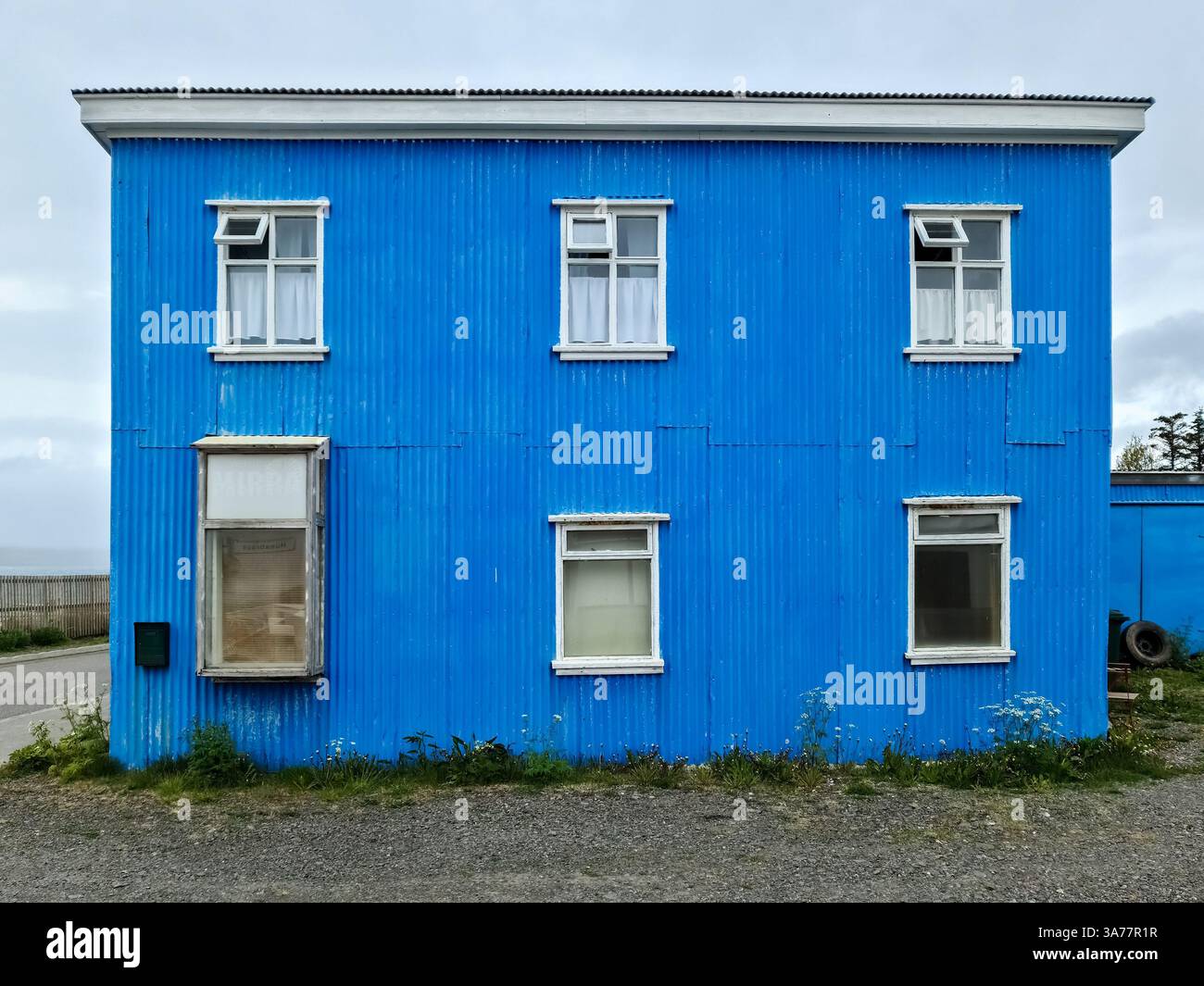 Iceland, Akureyri 22. June 2024, Traditional Icelandic house with blue ...