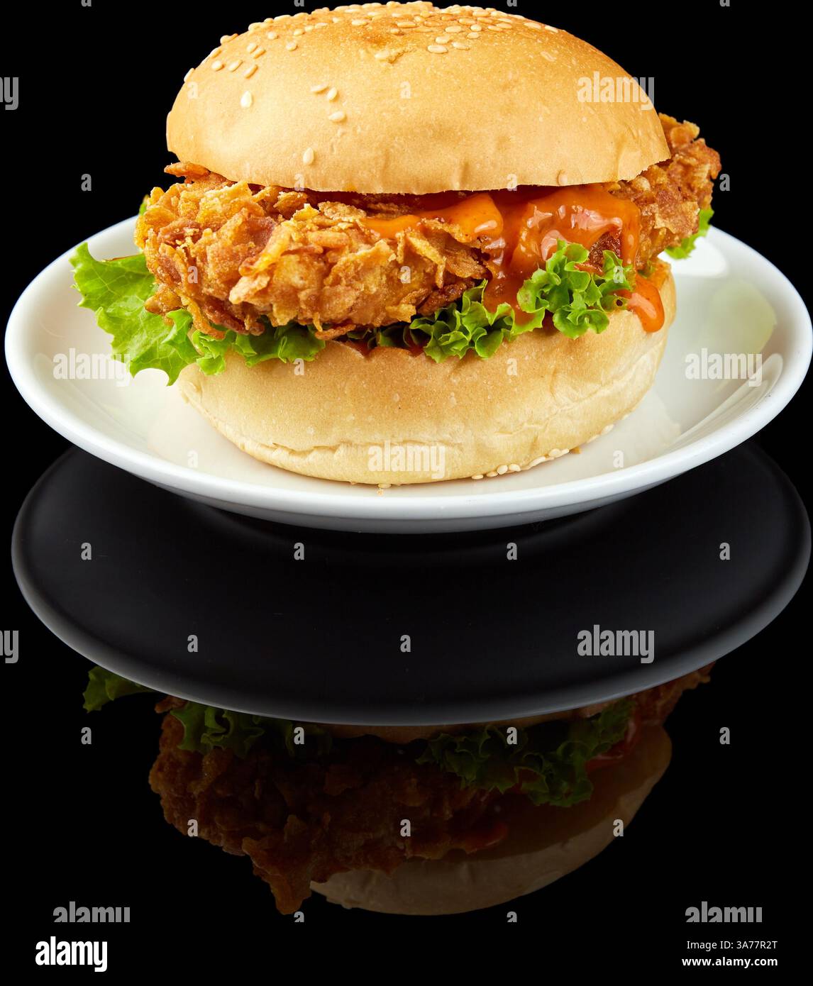 An irresistible chicken burger featuring a golden, crispy fried chicken ...
