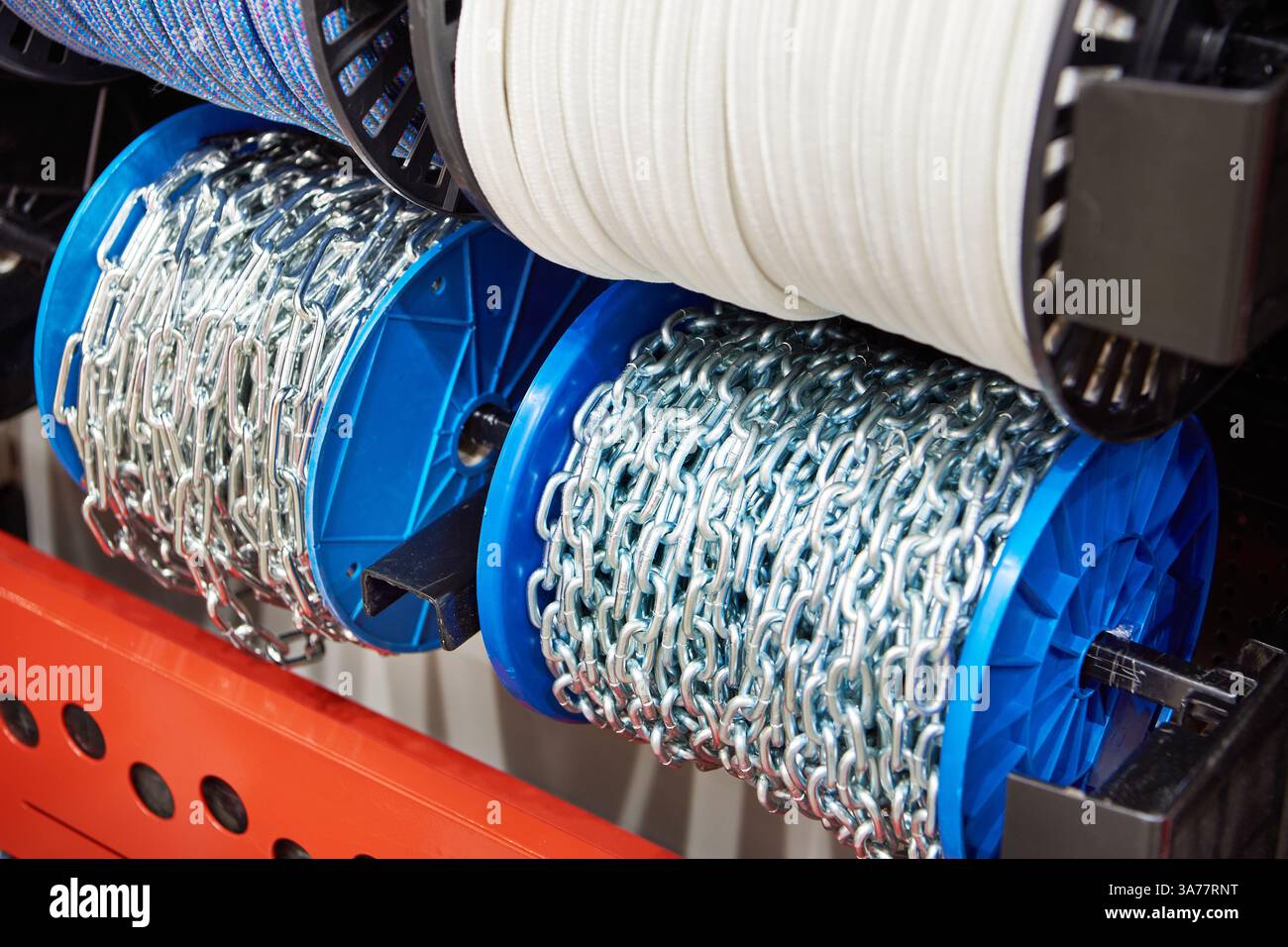 Metal chains and synthetic ropes in the store Stock Photo - Alamy