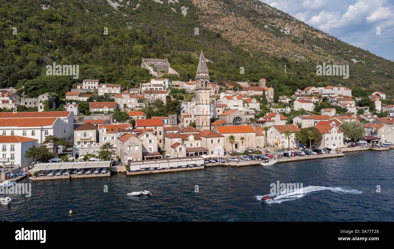 Aerial view of Perast city on a sunny day. Old venetian tourist town ...