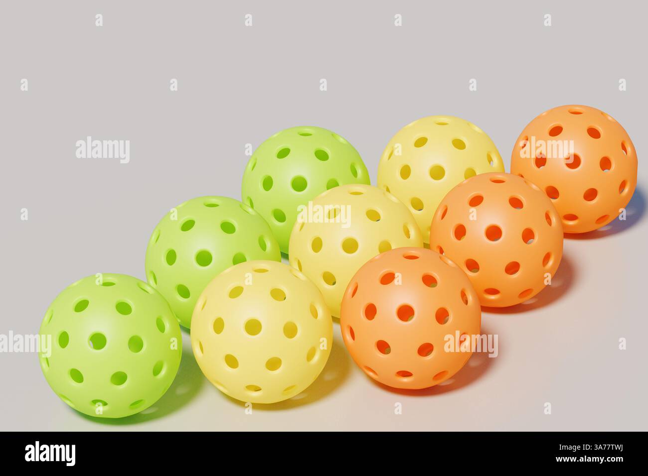 Colorful plastic pickleball balls arranged in a row, ideal for playtime ...