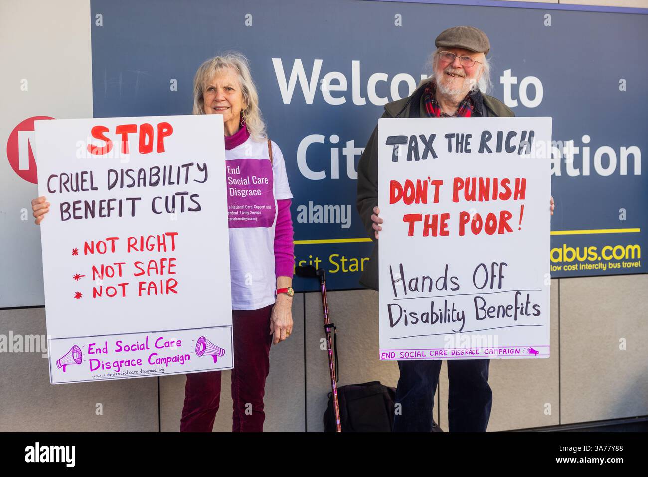 Leeds, UK. 26 MAR, 2025. Activists hold "Stop Cruel Disability benefit ...