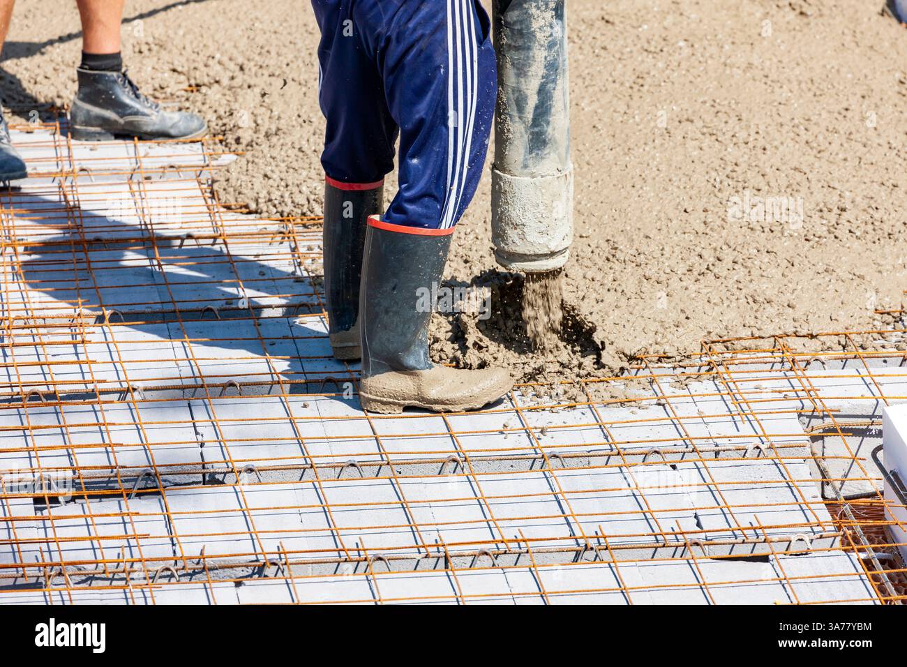 concrete worker during his work Stock Photo - Alamy