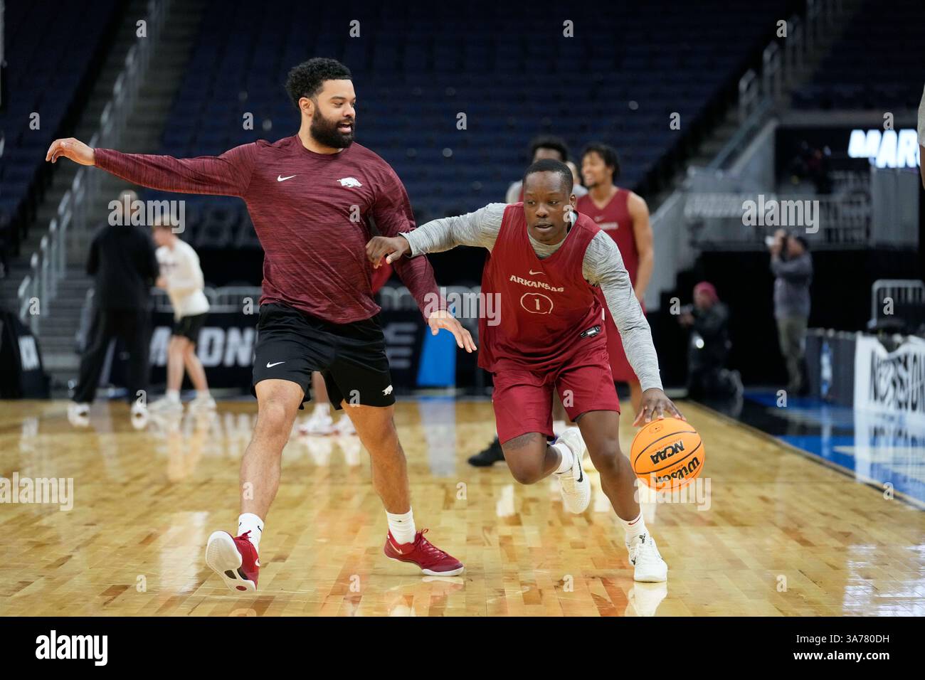 Arkansas guard Johnell Davis (1) dribbles during practice Wednesday ...