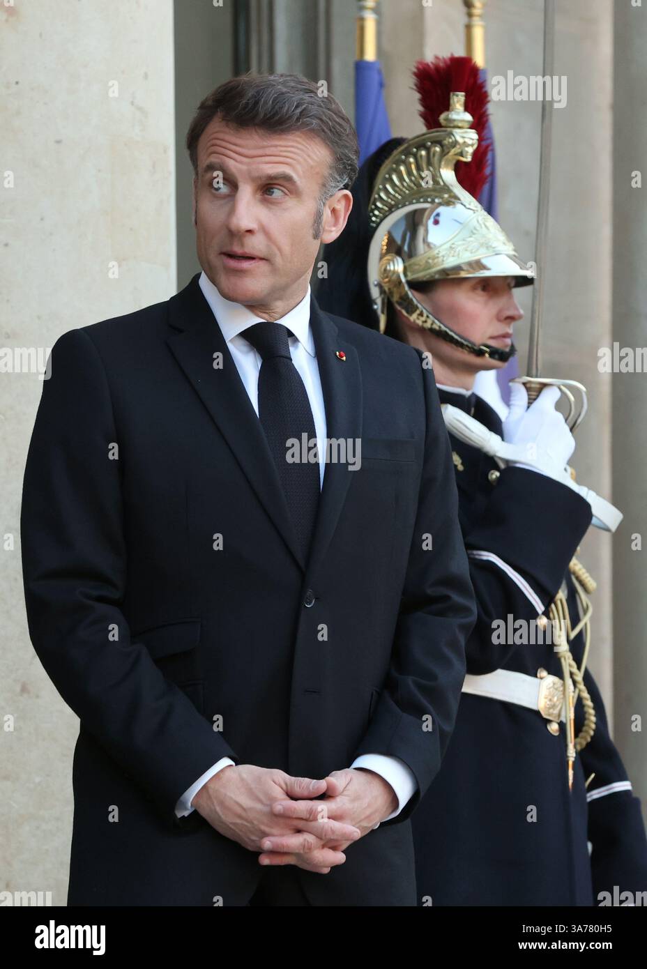 French President Emmanuel waits to greet Ukrainian President Volodymyr ...