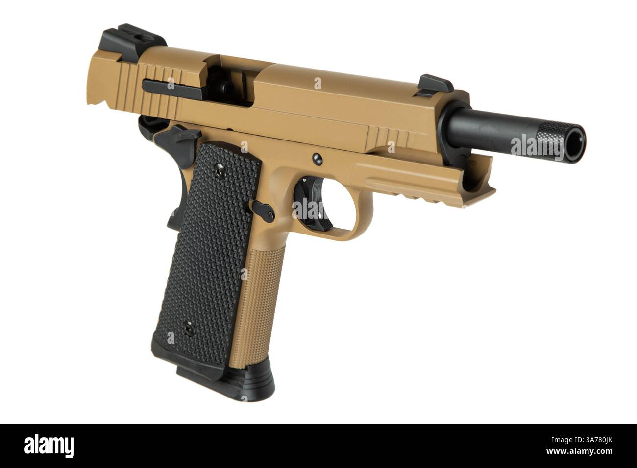 A tan and black airsoft pistol replica with a textured grip, tactical ...
