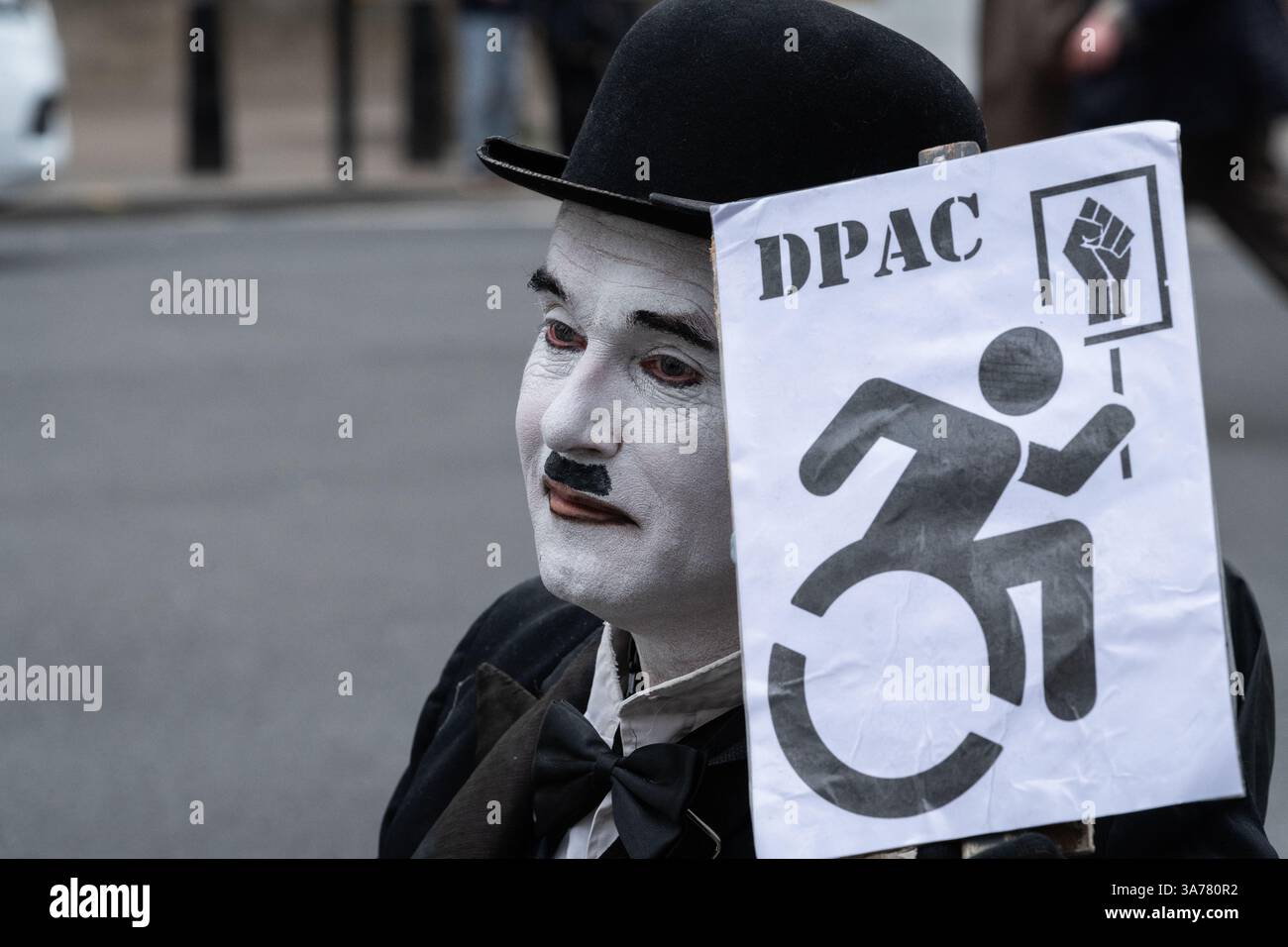 London, UK. 26 March, 2025. Activist Neil Goodwin, aka 'CharlieX ...