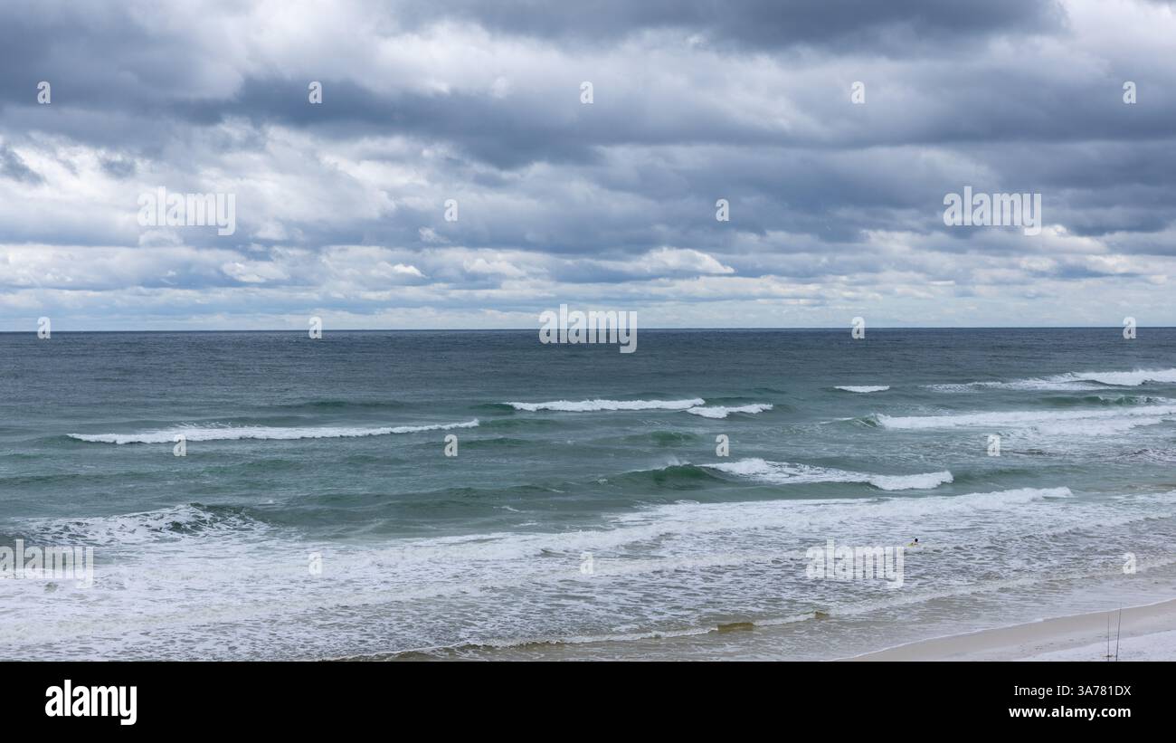 The photo captures a moody beach scene along Florida’s scenic 30A ...